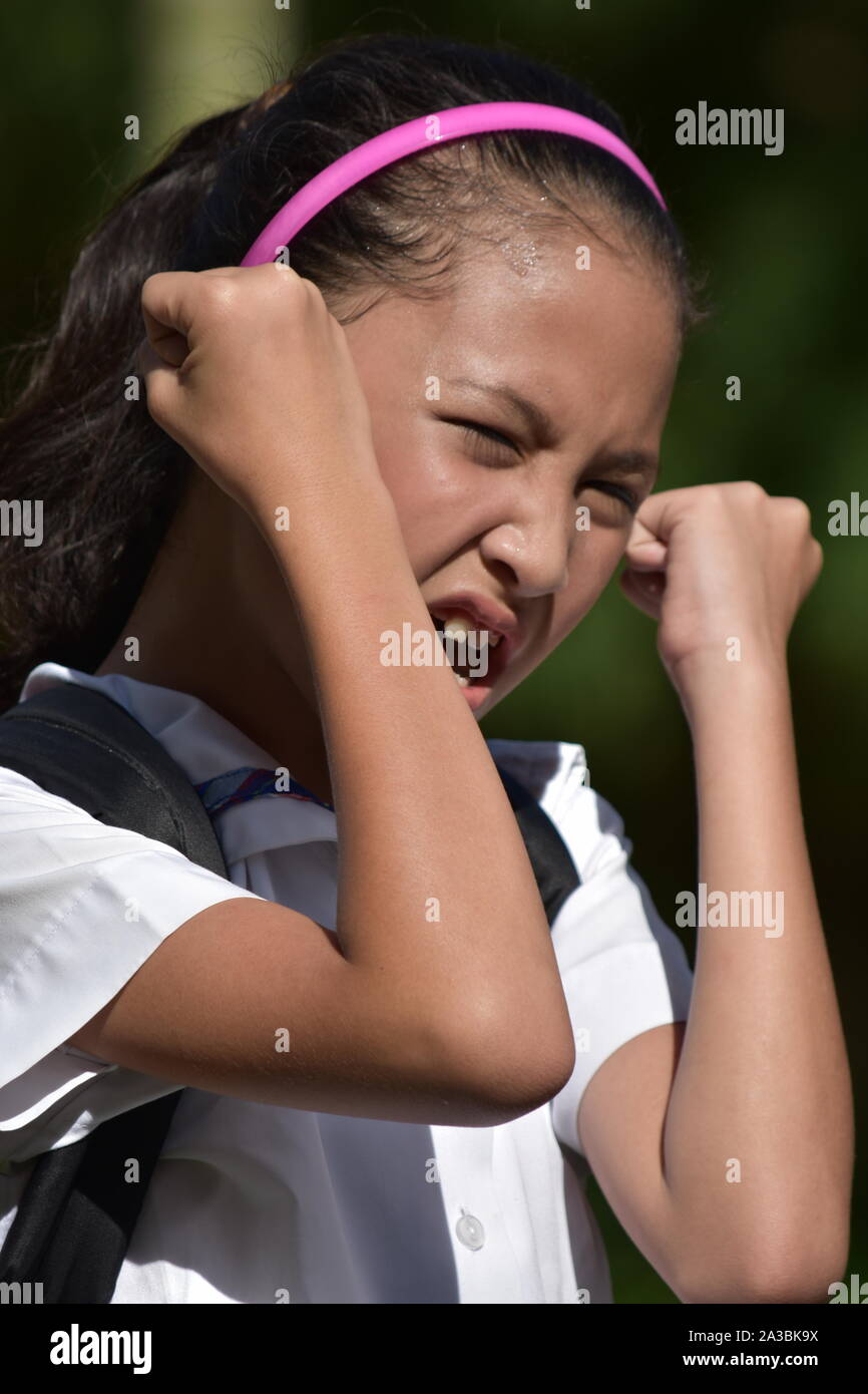 Angry girl kid book hi-res stock photography and images - Alamy