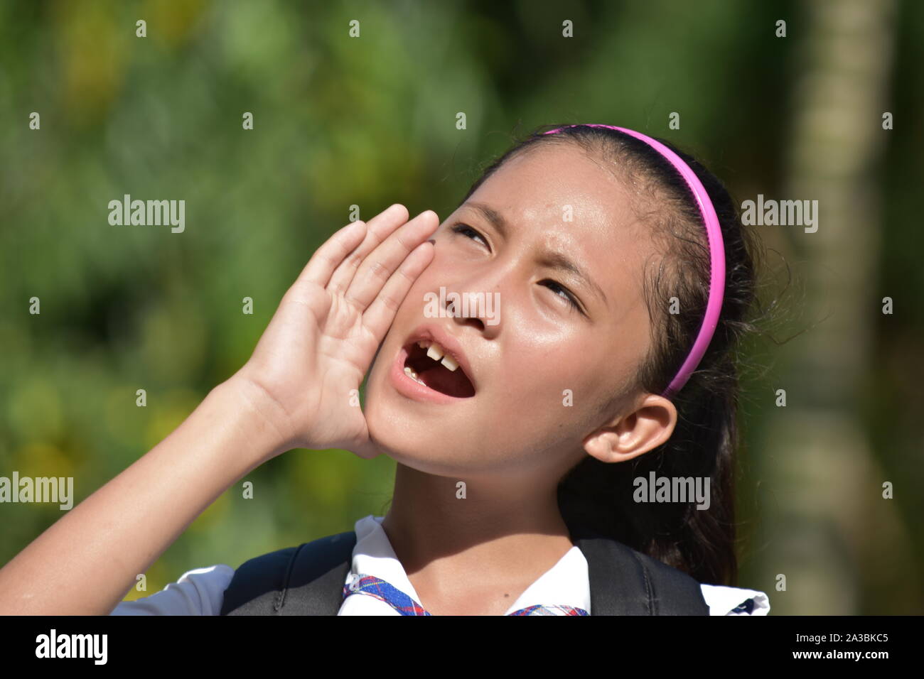 A Beautiful Female Student Yelling Stock Photo - Alamy