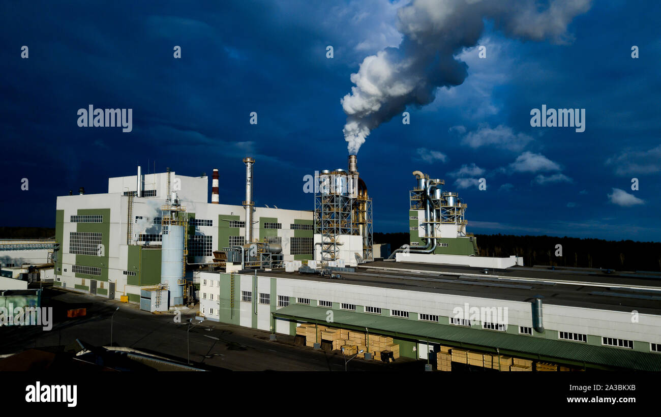 smoke from factory chimneys against a dark sky aerial photography from ...