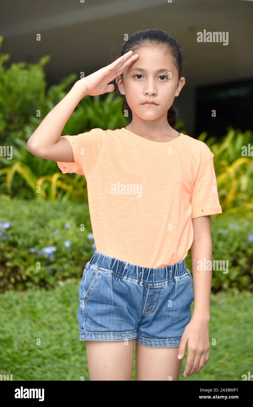 A Pretty Asian Girl Saluting Stock Photo - Alamy