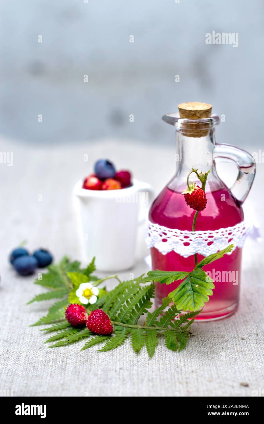 tasty homemade syrup with wild forest fruits Stock Photo - Alamy