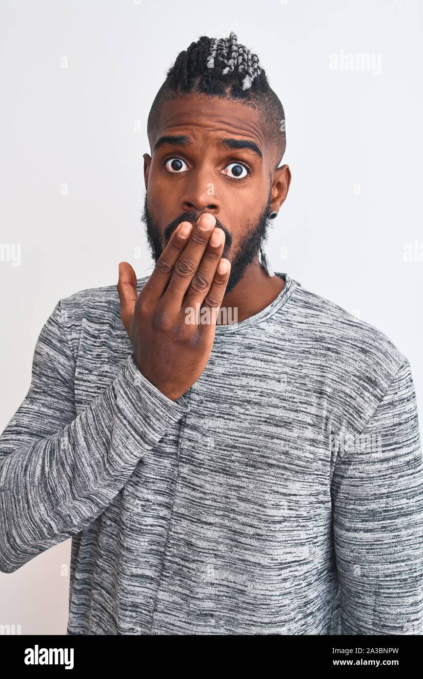 African american man with braids wearing grey sweater over isolated ...