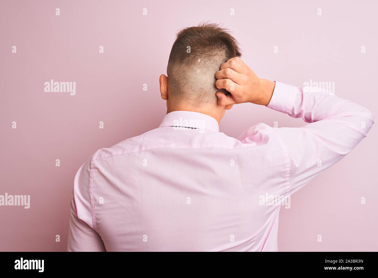 Young handsome businessman wearing shirt and tie standing over isolated ...