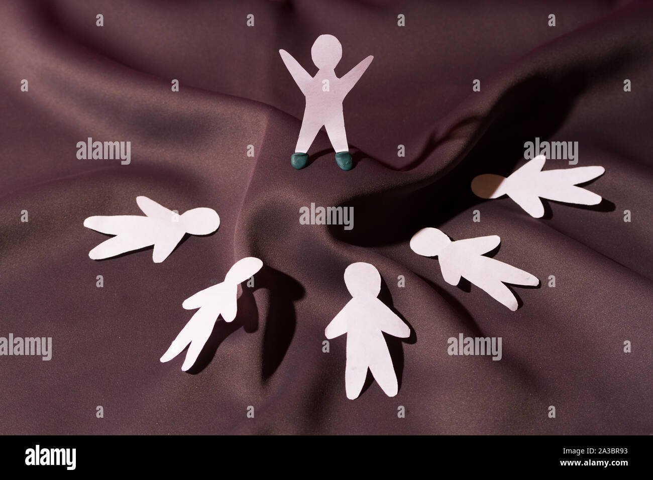 Sect concept image. Many people worship one person Stock Photo - Alamy