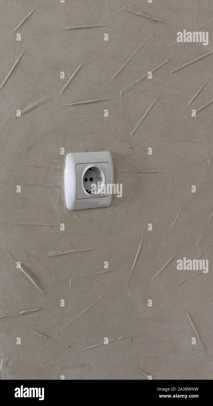 White power socket on wall Stock Photo - Alamy