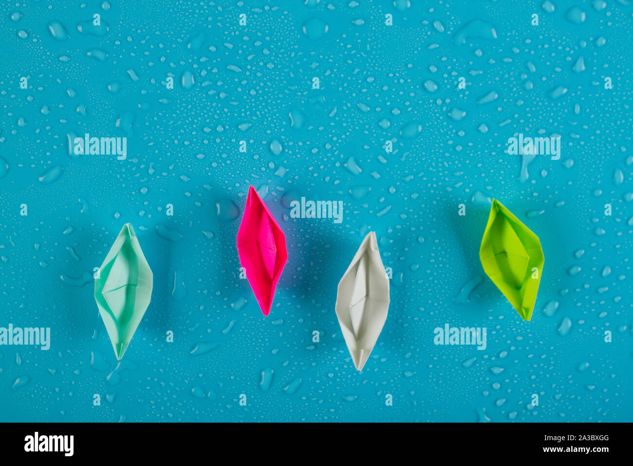 Colorful paper ships. Beach holiday concept image Stock Photo - Alamy
