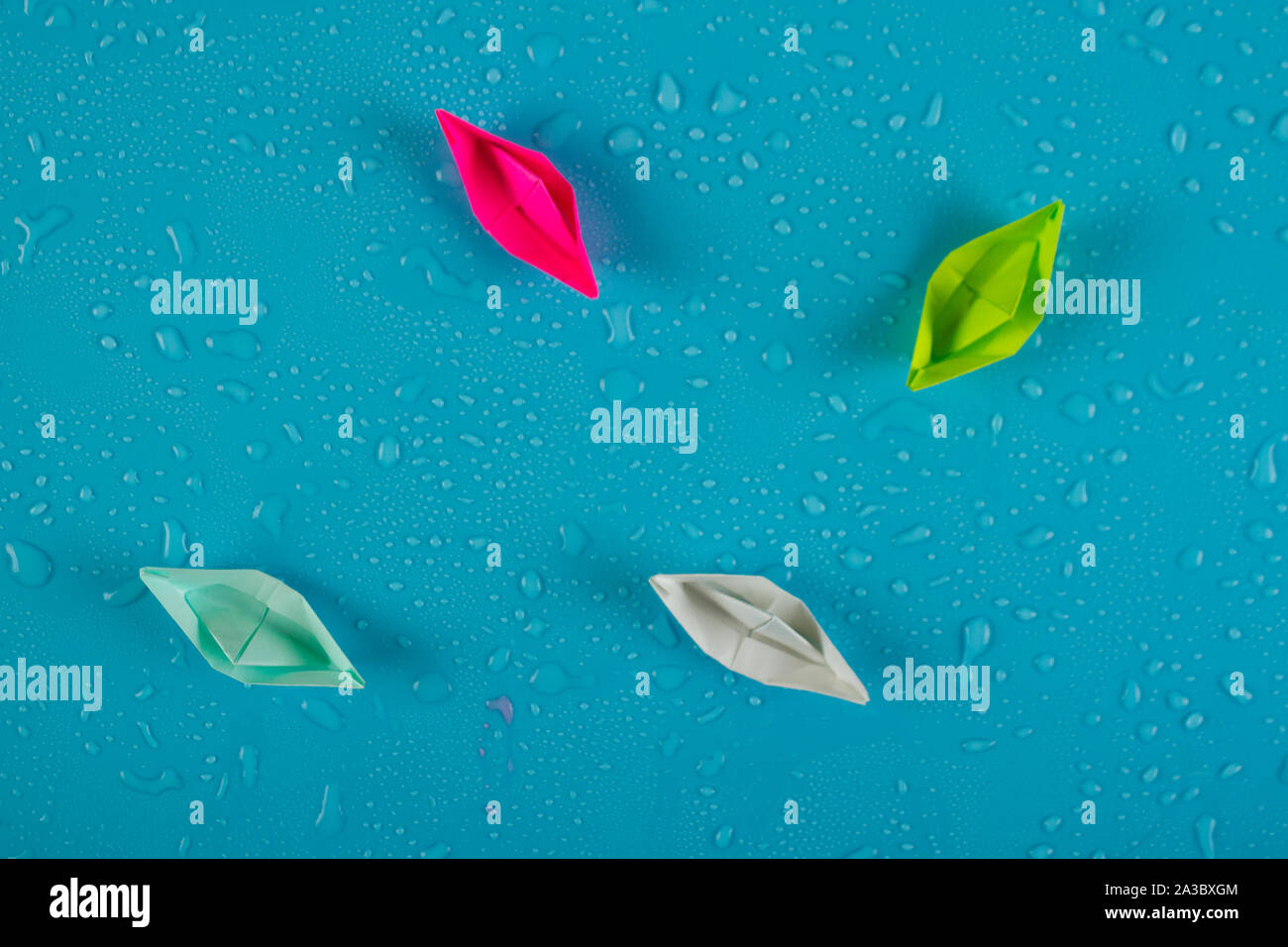 Colorful paper ships. Beach holiday concept image Stock Photo - Alamy