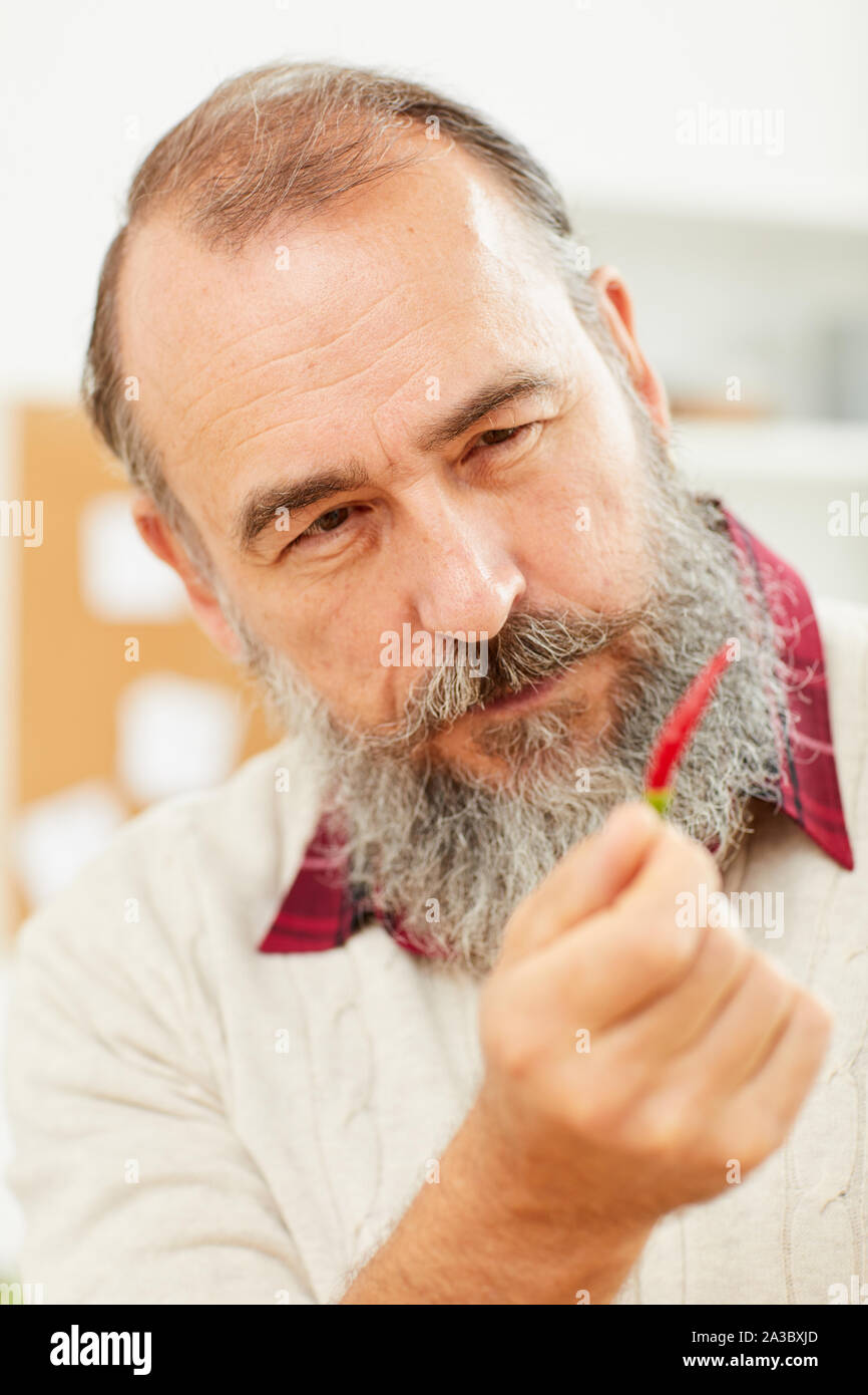 Man Eating Chili Pepper High Resolution Stock Photography and Images ...