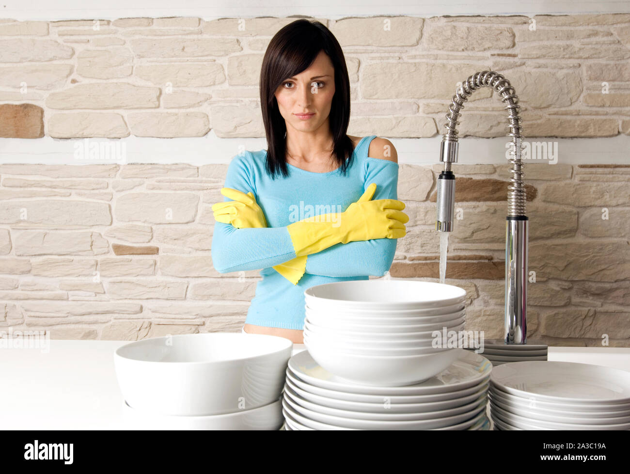 woman washing plates Stock Photo - Alamy