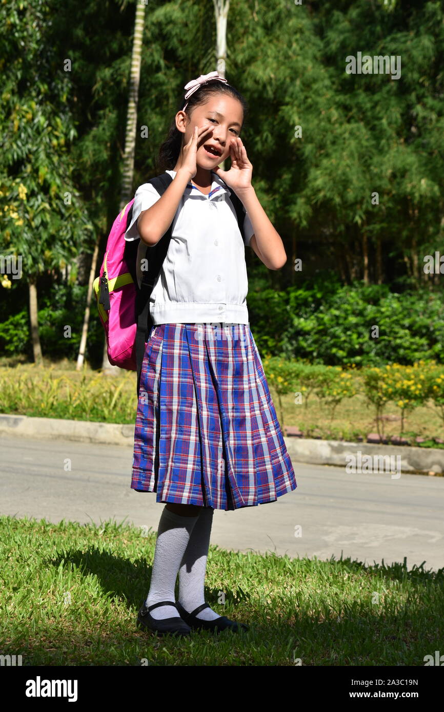 Pretty Minority Girl Student Talking With Books Stock Photo - Alamy