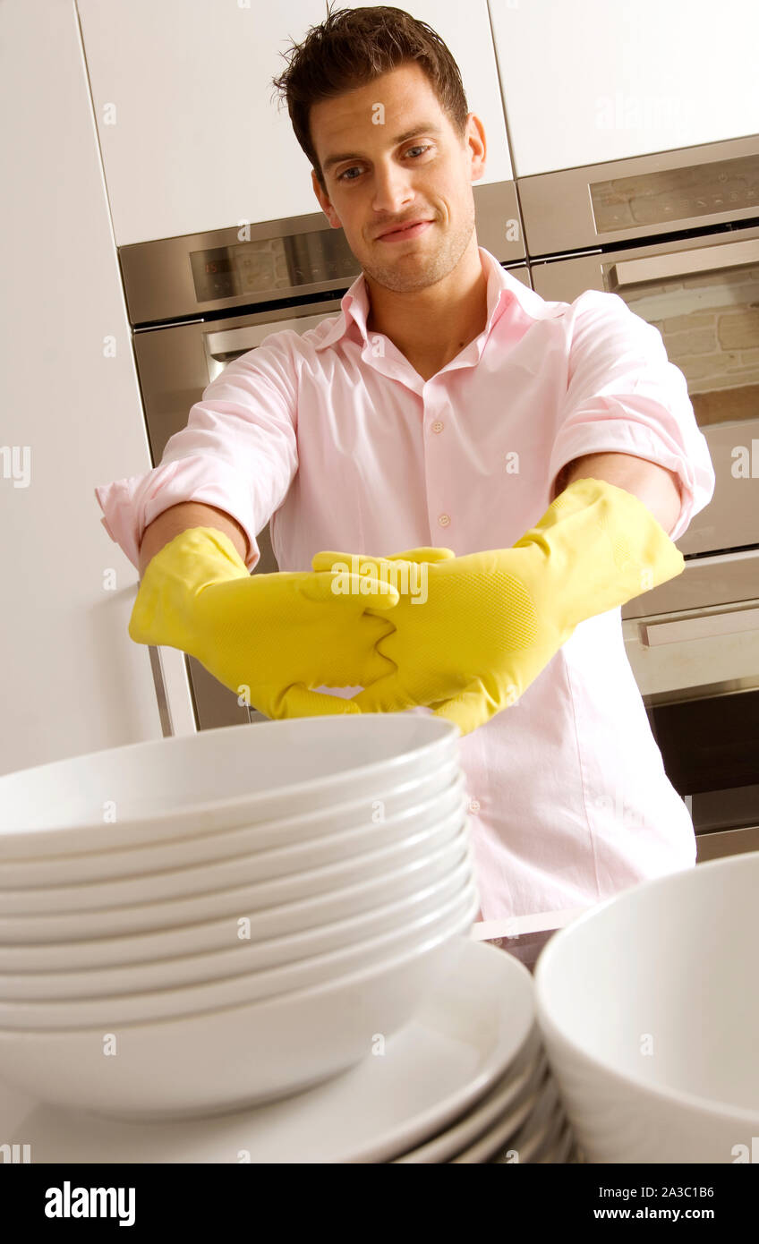 man washing plates Stock Photo - Alamy