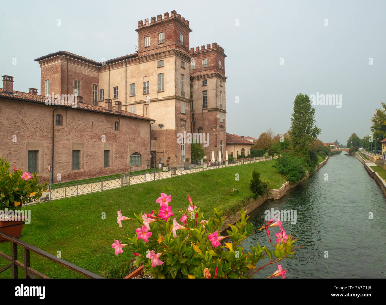 bike path in the green countryside of Lombardy along the Naviglio ...