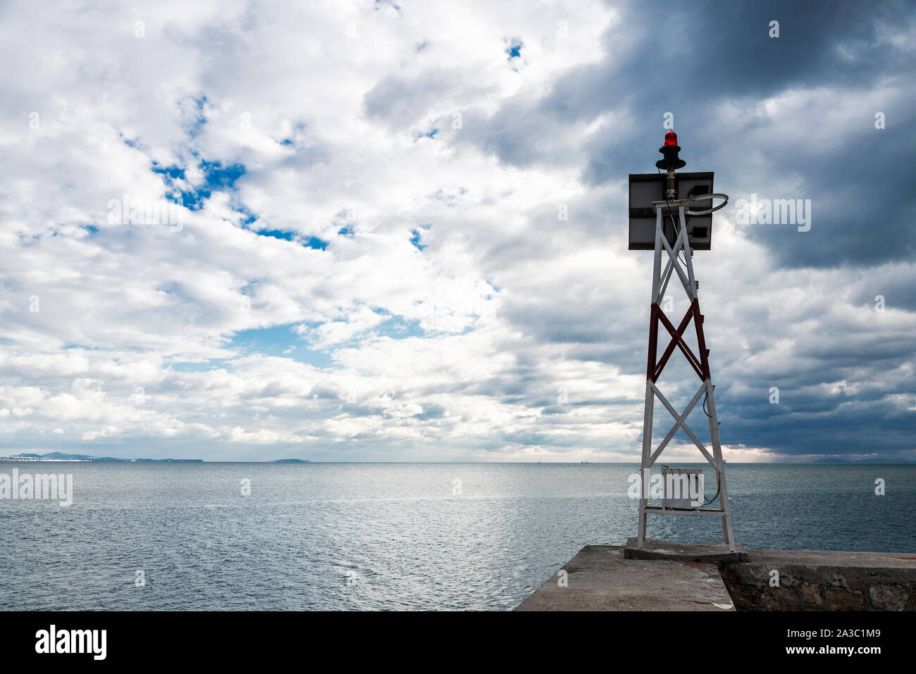 Lighthouse in the port of Athens with the sea in the background in ...