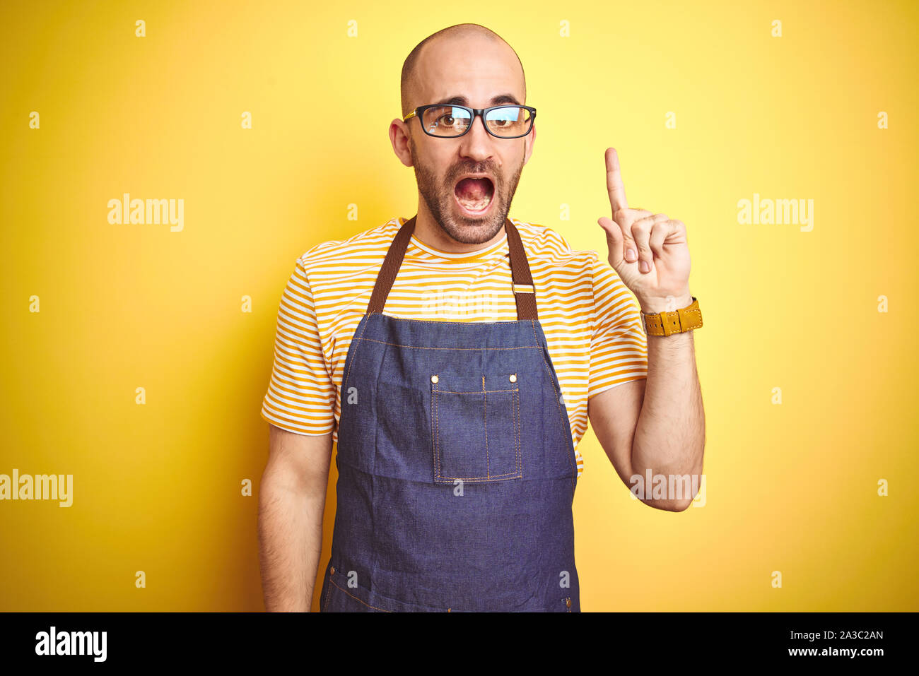 Good looking smiling smart bartender hi-res stock photography and ...