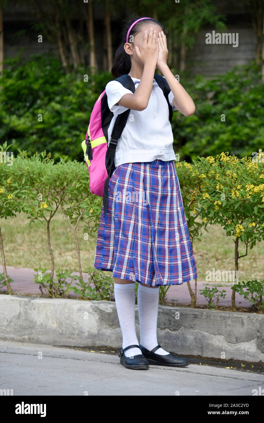 Failed Prep Girl Student Wearing Uniform With Books Stock Photo - Alamy