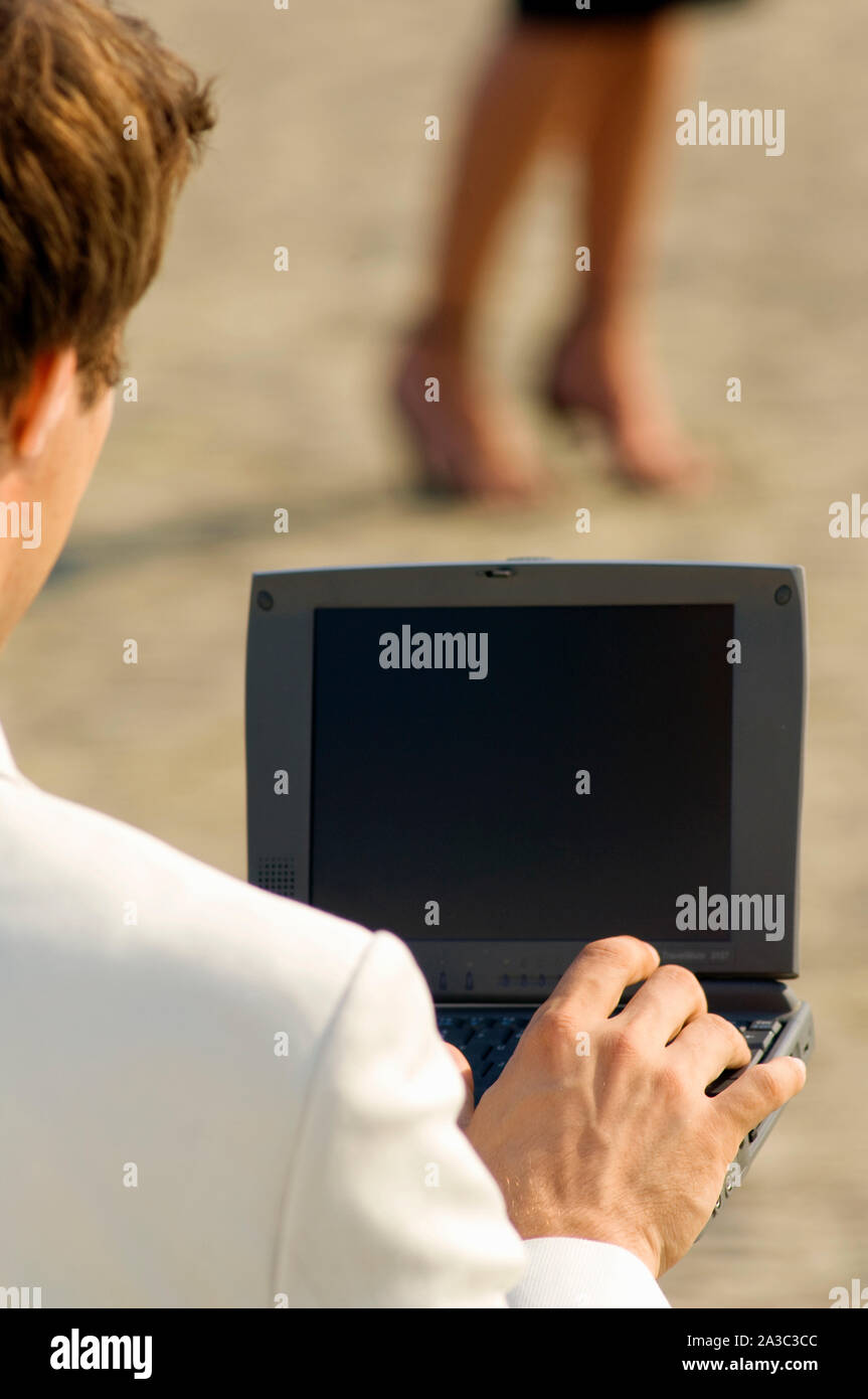 Man business suit beach back view hi-res stock photography and images ...