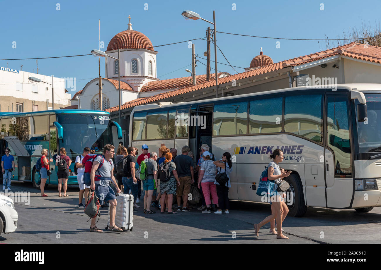 Rethymno, western Crete, Greece. September 2019. Travellers boarding ...
