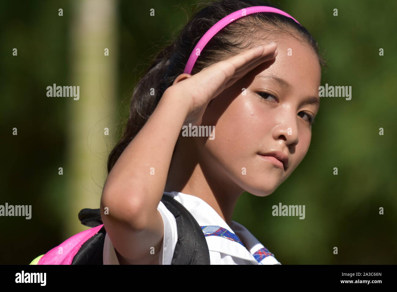 Minority School Girl Student Teenager Saluting With Notebooks Stock ...
