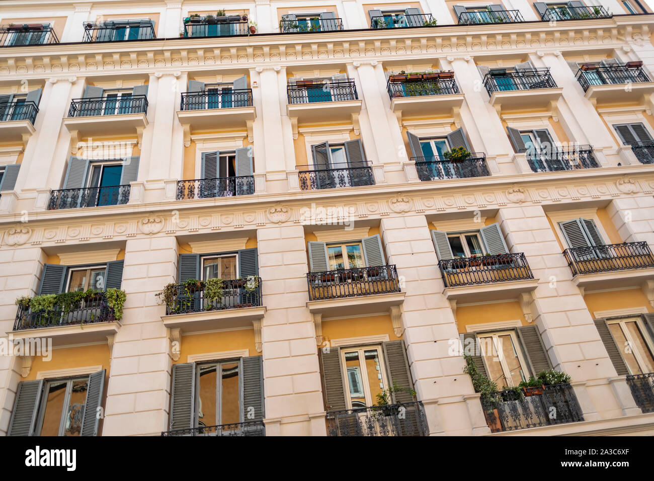 View of a traditional house building architecture with windows in Rome ...