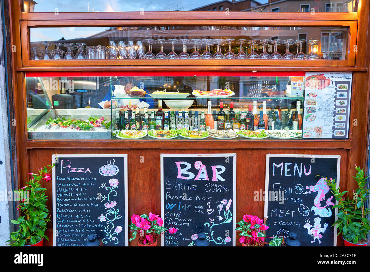 VENICE, ITALY - CIRCA MAY, 2019: food and drinks on display at a ...