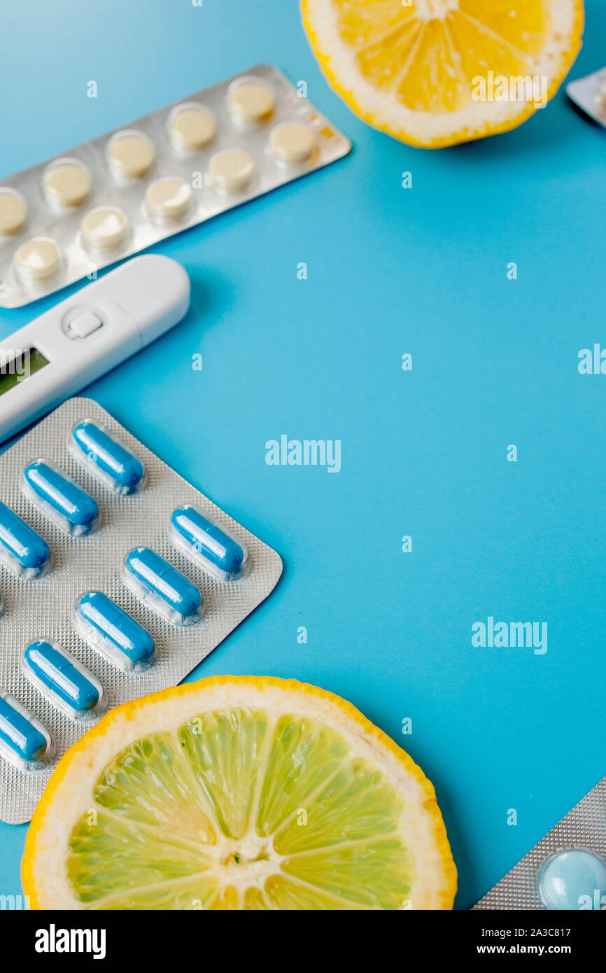 Medications, pills, thermometer, traditional medicine for treating ...