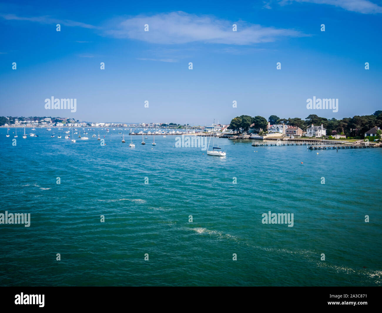 The harbour and bay at Poole in the south coast county of Dorset ...