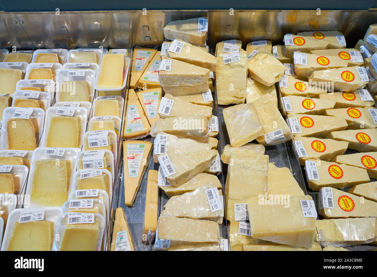 VENICE, ITALY - CIRCA MAY, 2019: cutted cheese on display at InterSPAR ...