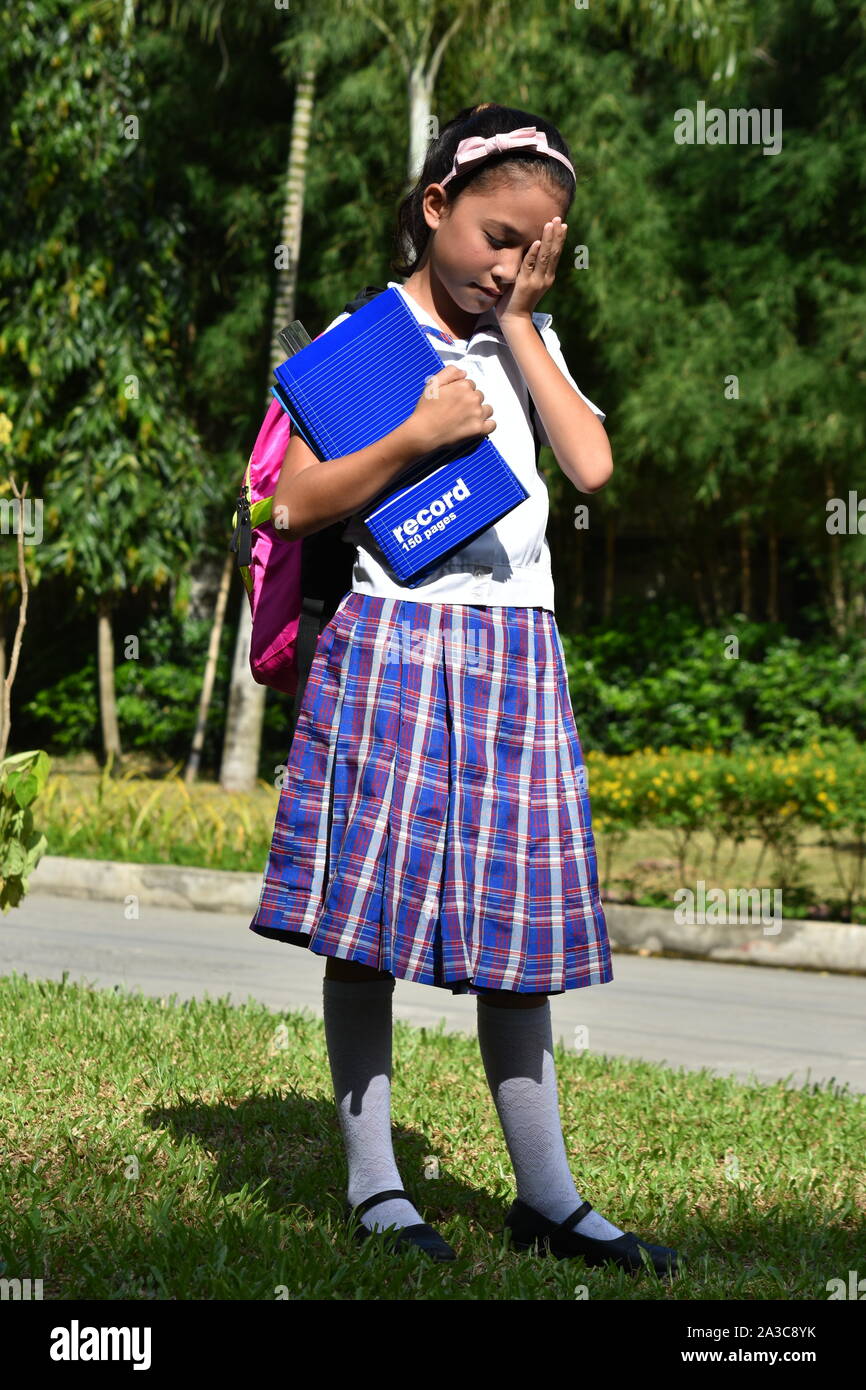 Filipina Girl Student And Sadness With Notebooks Stock Photo - Alamy