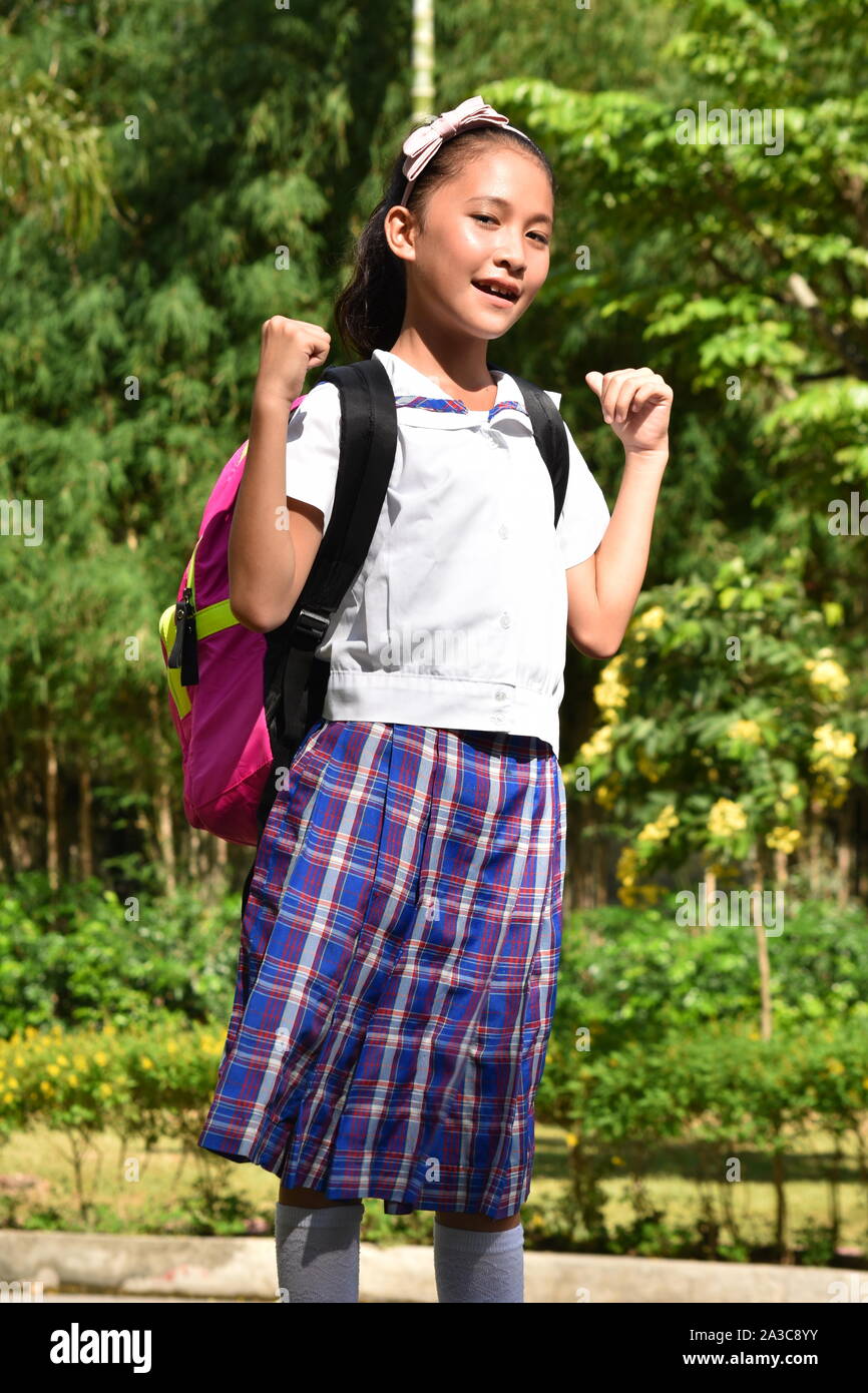 A Successful Girl Student With Notebooks Stock Photo - Alamy