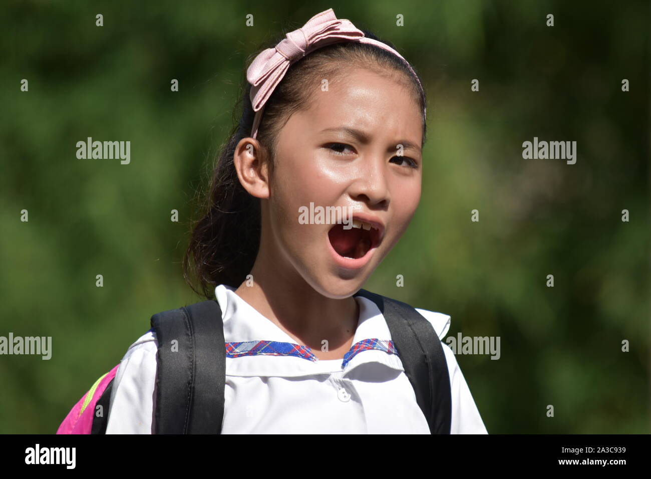 A Young School Girl Shouting Stock Photo - Alamy