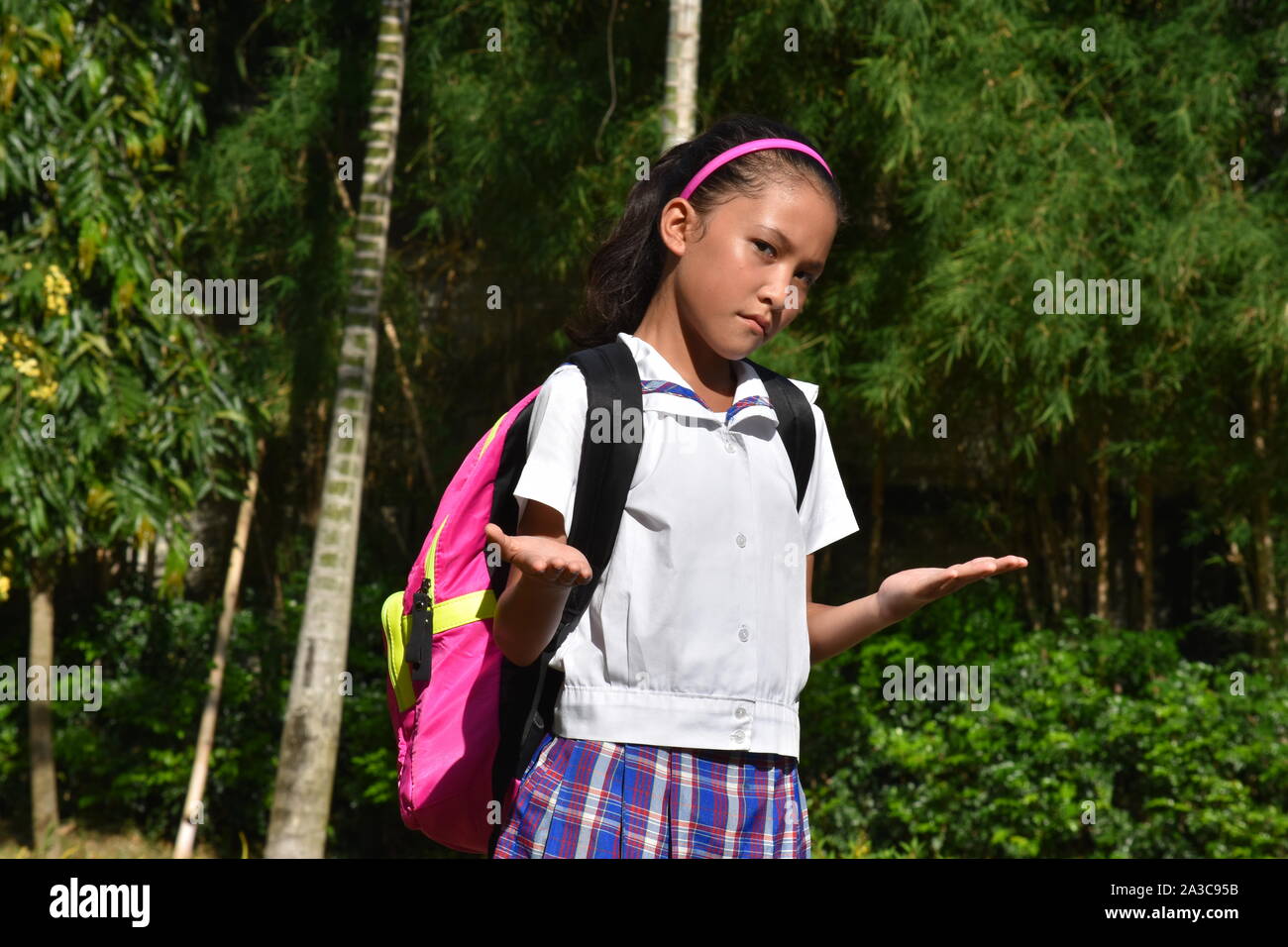 An An Undecided Girl Student Stock Photo - Alamy