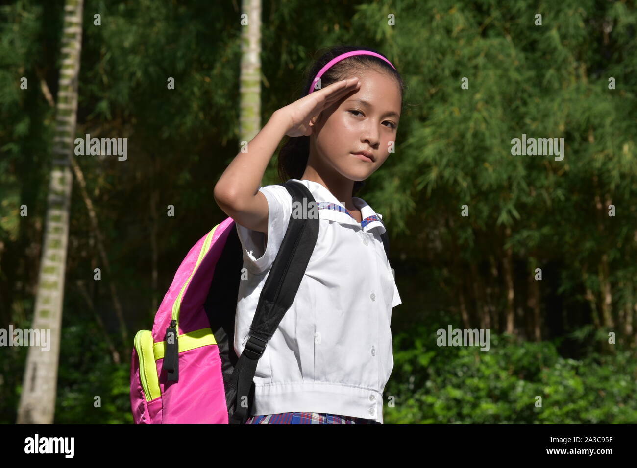 Catholic Asian Girl Student Saluting Wearing Uniform Stock Photo - Alamy