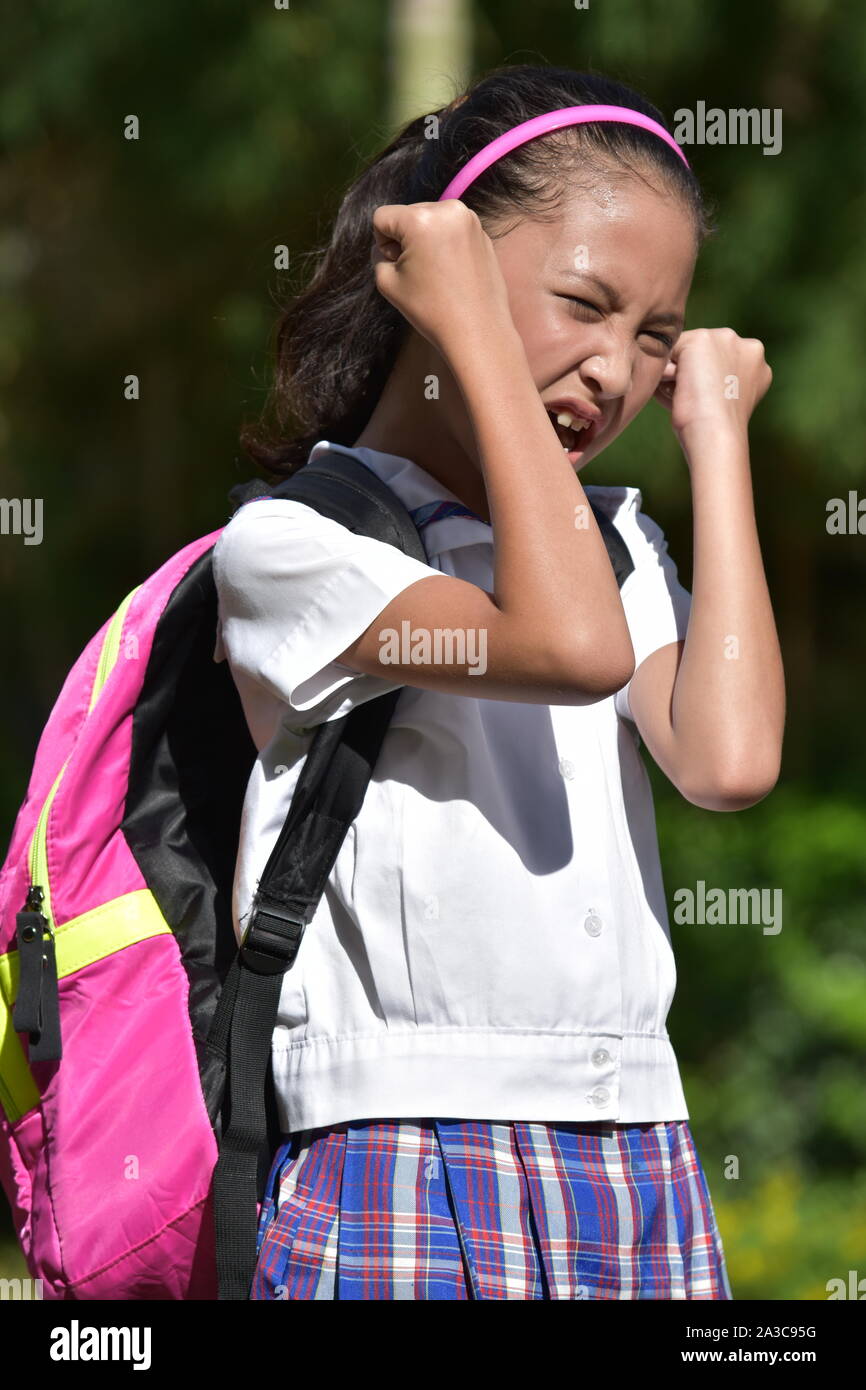 An Angry Female Student With Notebooks Stock Photo - Alamy