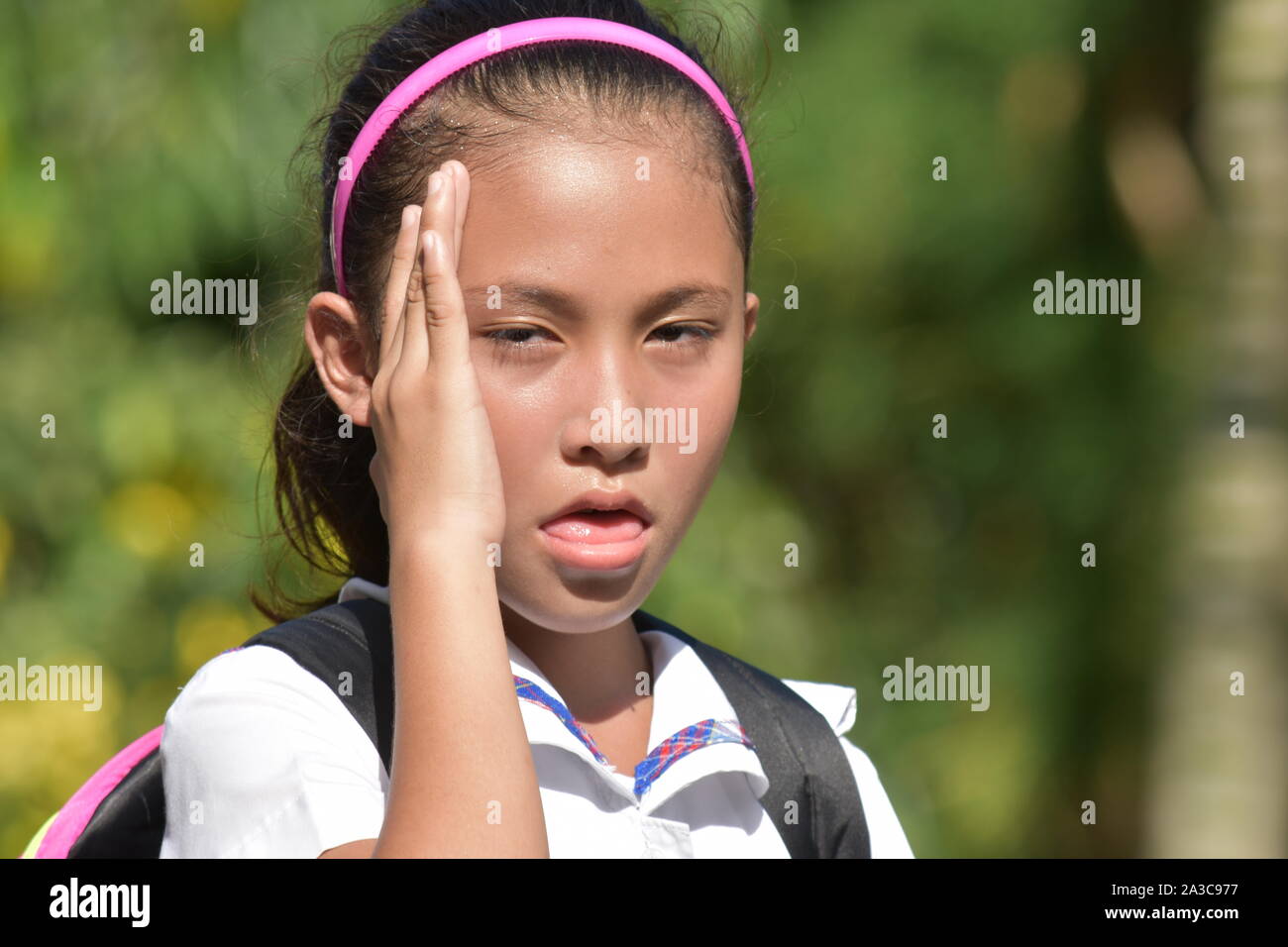 Female Student Poor Health With Books Stock Photo - Alamy