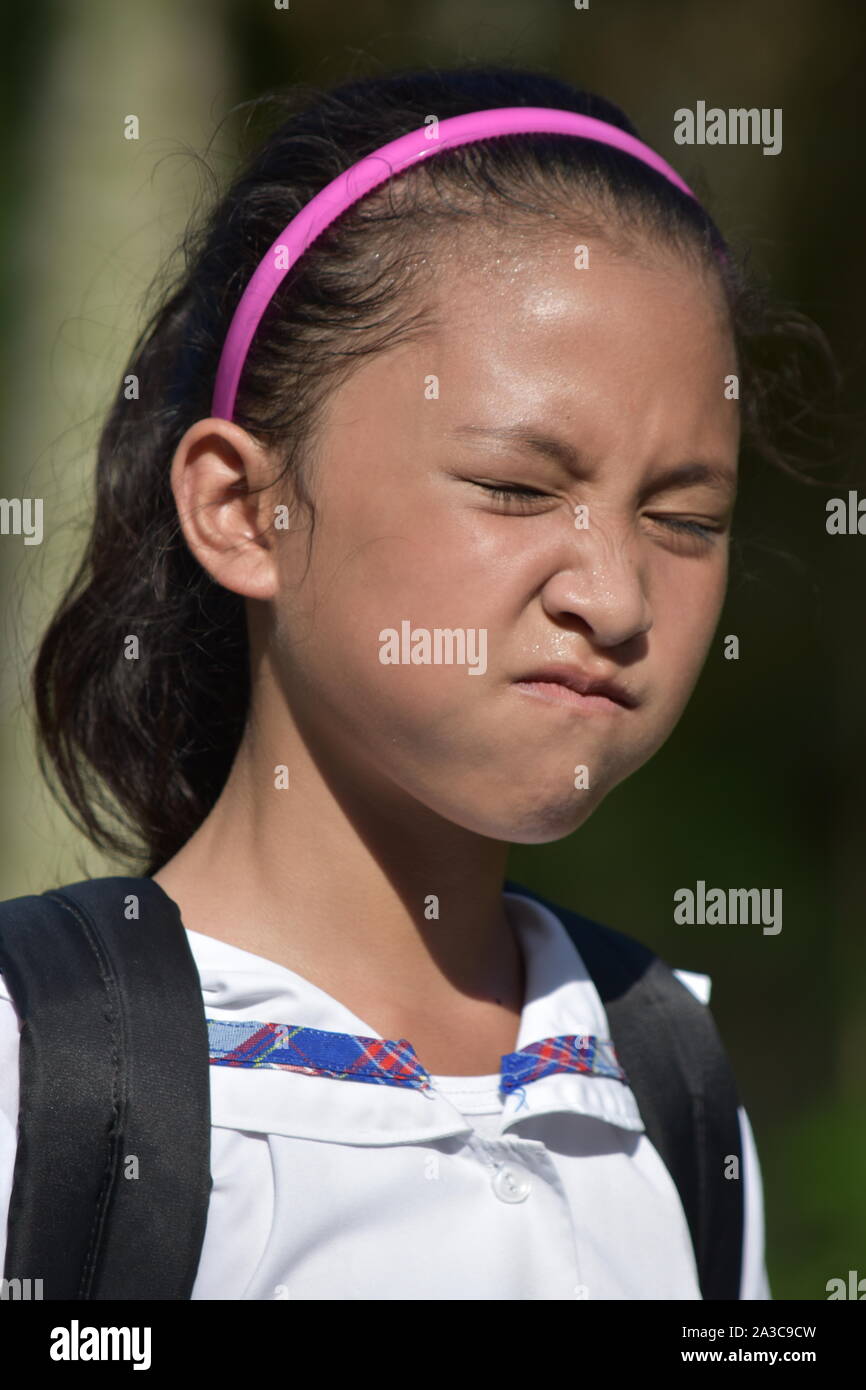 A Confused Youthful Filipina Person Stock Photo - Alamy