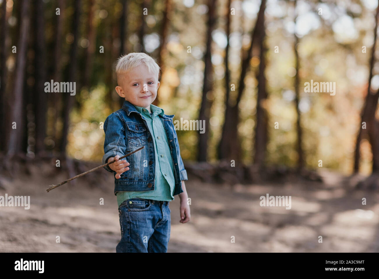 Emotional portrait of a happy and cheerful little boy, running after a ...