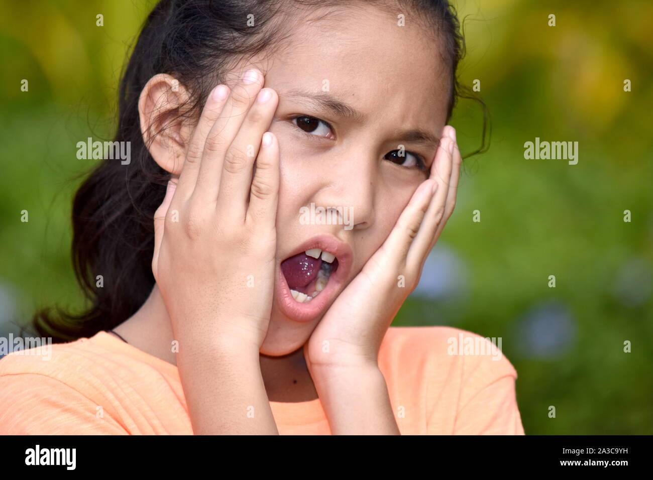 A Startled Young Diverse Person Stock Photo - Alamy
