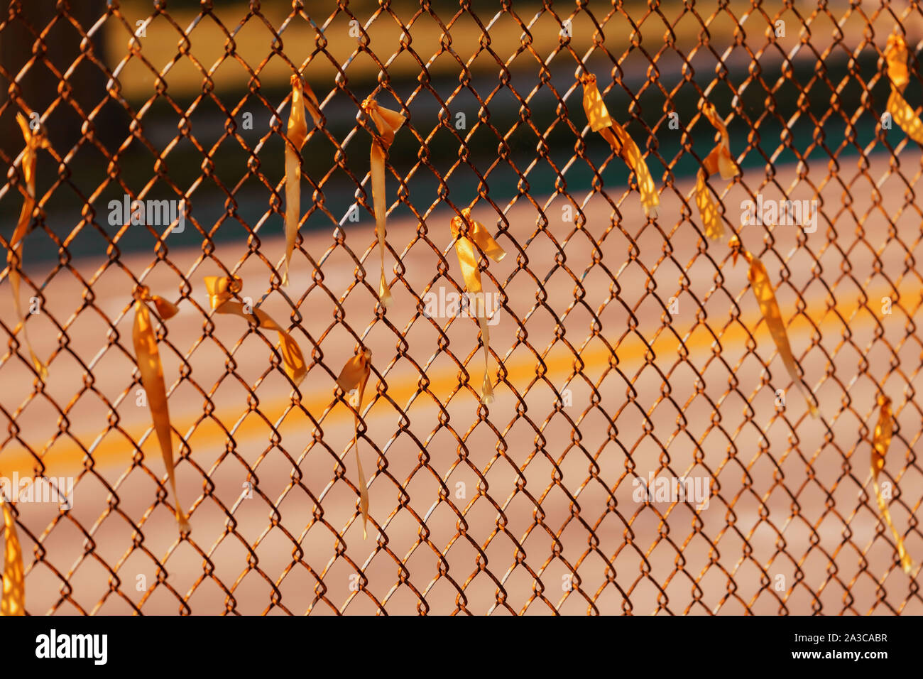 a rusty section of a rusty chain link fence with ribbons on it Stock ...