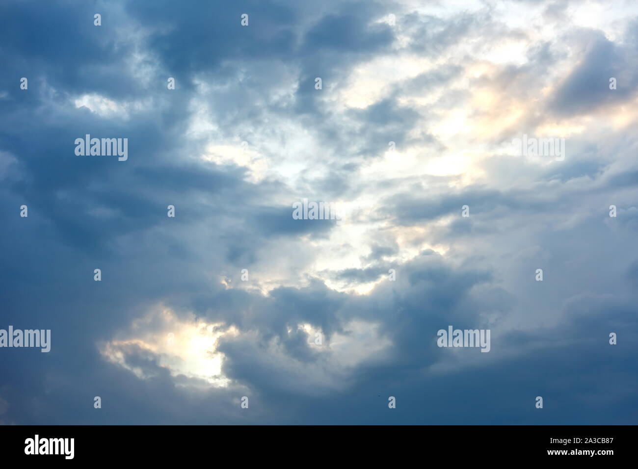 Thick beautiful clouds and clouds in the sky. Cloudy weather before the ...