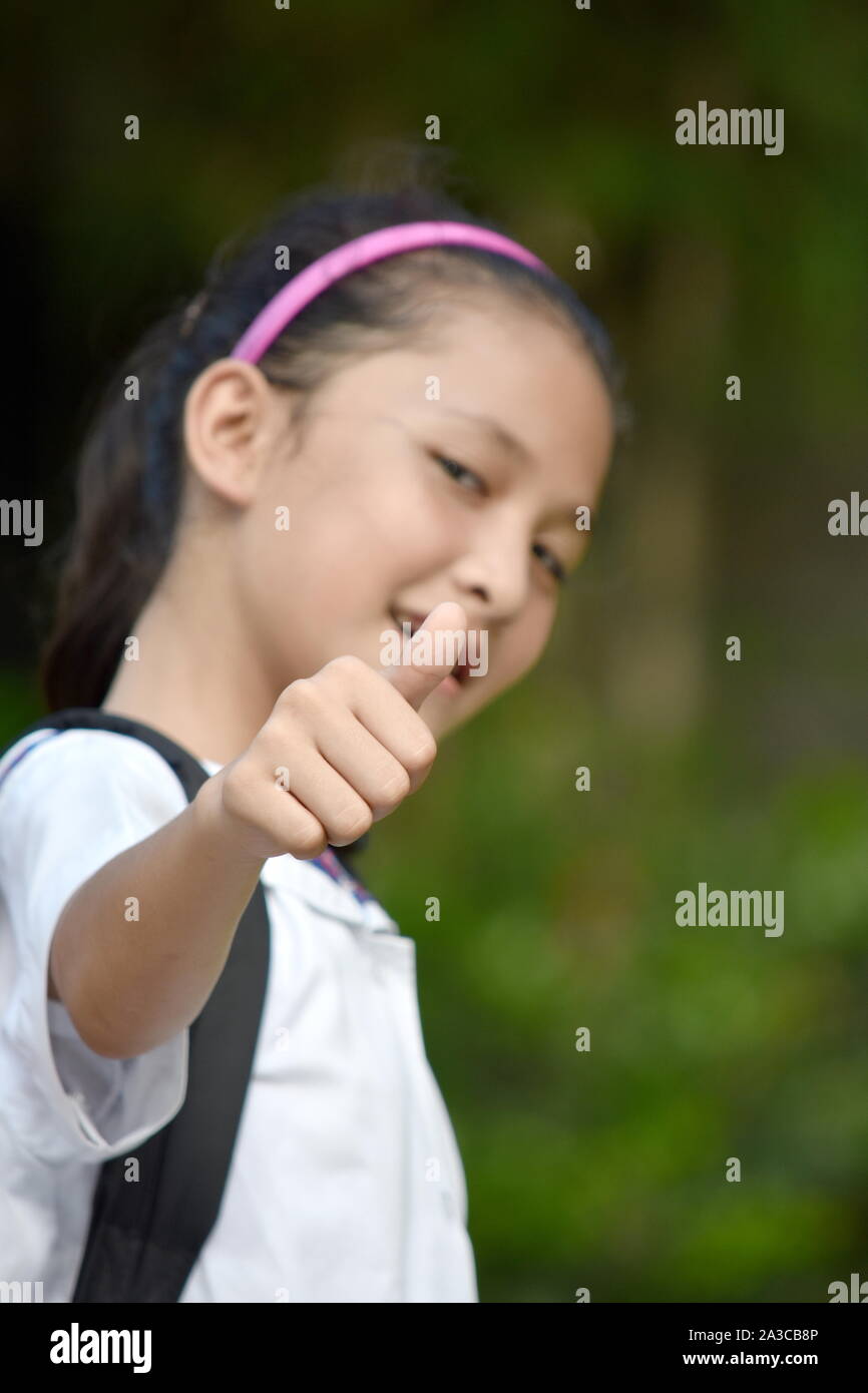 An Appreciative Filipina Girl Student Stock Photo - Alamy