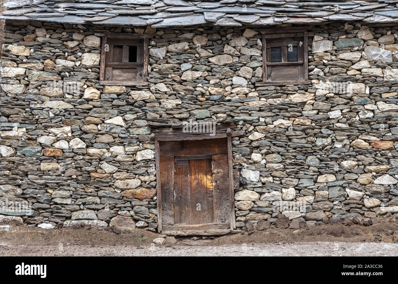Traditional rural stone house in high mountains of Nepal; Sagarmatha ...