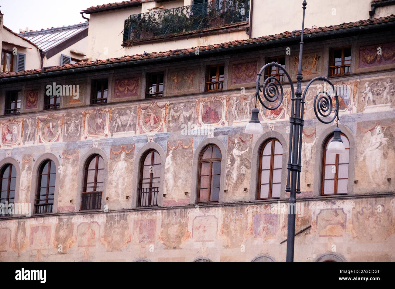 Medieval fresco paintings on Palazzo dell Antella in Florence, Italy, a ...