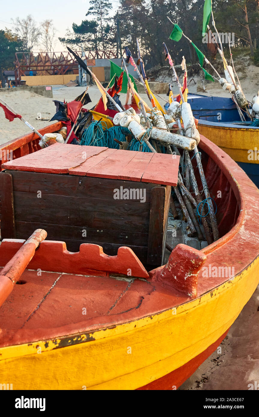 Traditional Polish fishing boats (Kutry) during a sunset on a beach ...