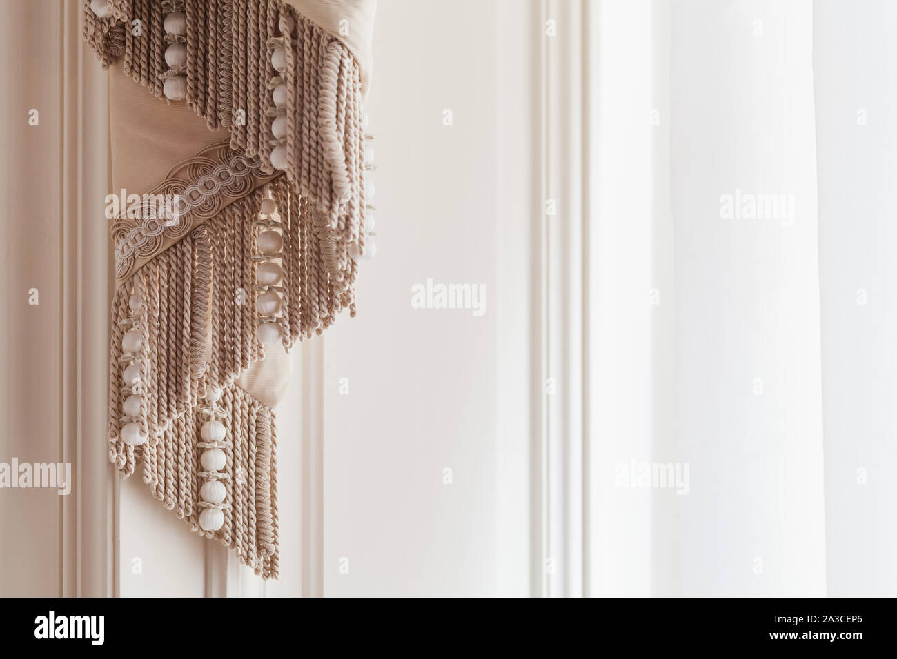 Gold fabric fringe hi-res stock photography and images - Alamy