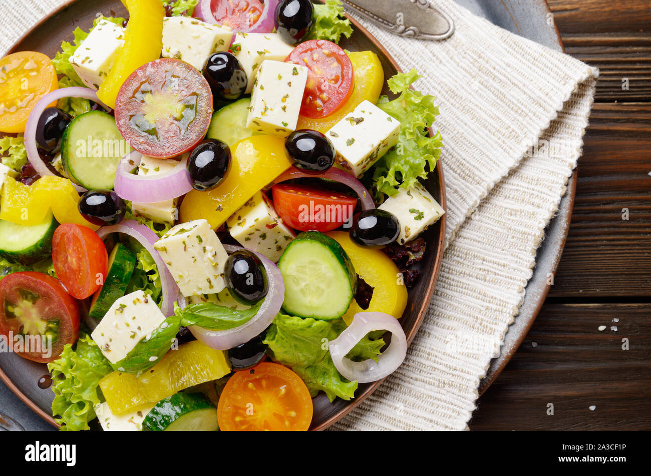 Top view at Mediterranean diet dish greek salad on vintage metal tray ...