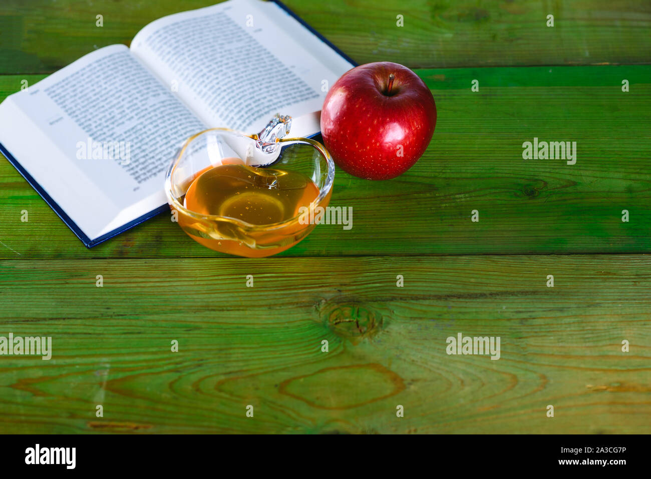 Rosh Ha Shana - Jewish new year composition of an red apple, Torah and ...