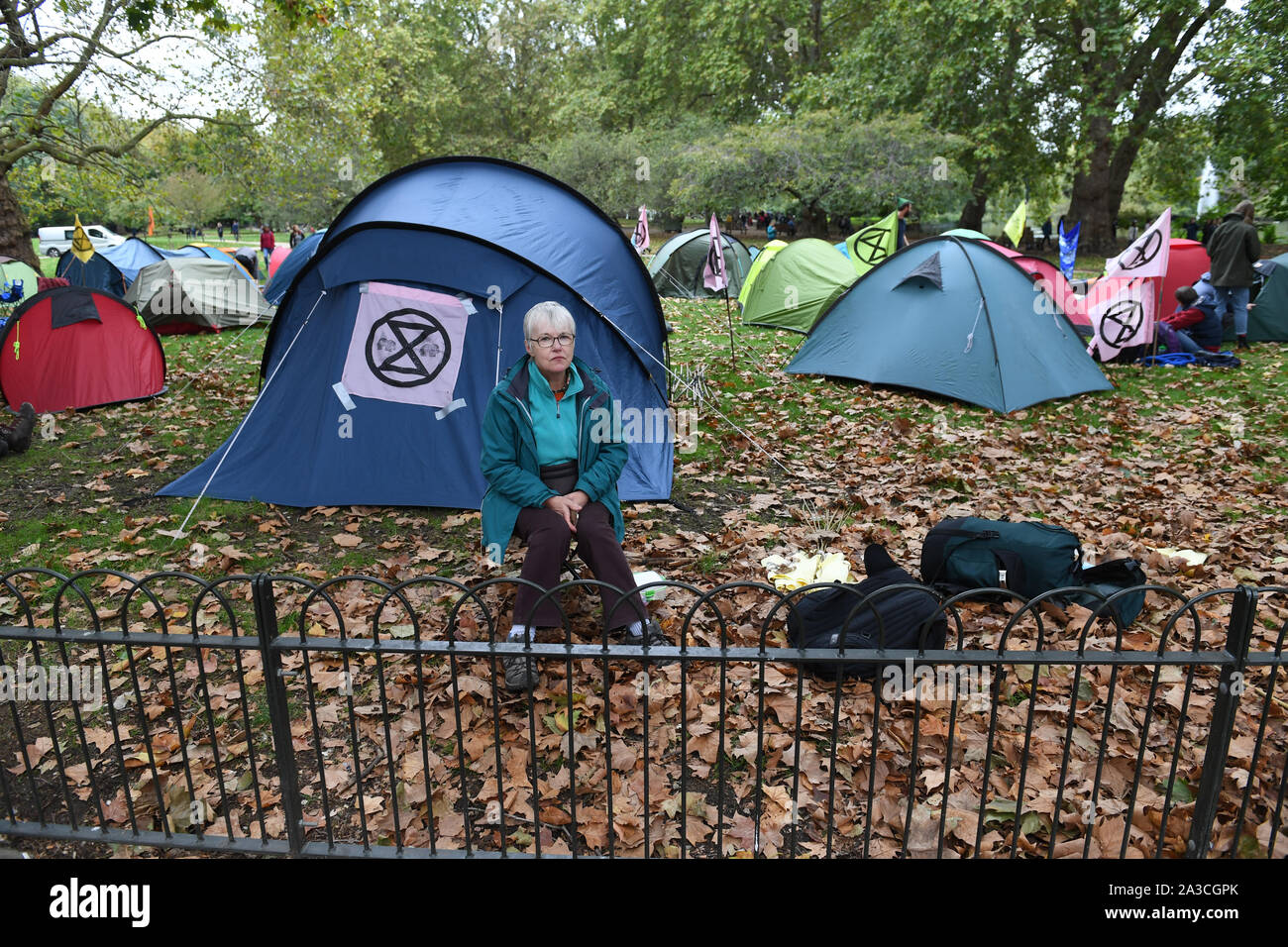 Protesters set up tents in a camp during an Extinction Rebellion (XR ...