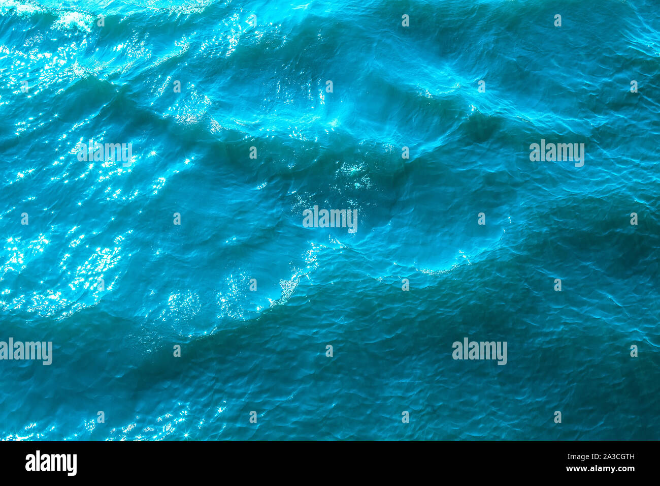 Blue sea surface with sunlight, top view Stock Photo - Alamy
