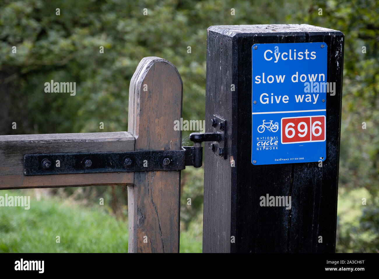 Cyclists slow sign hi-res stock photography and images - Alamy
