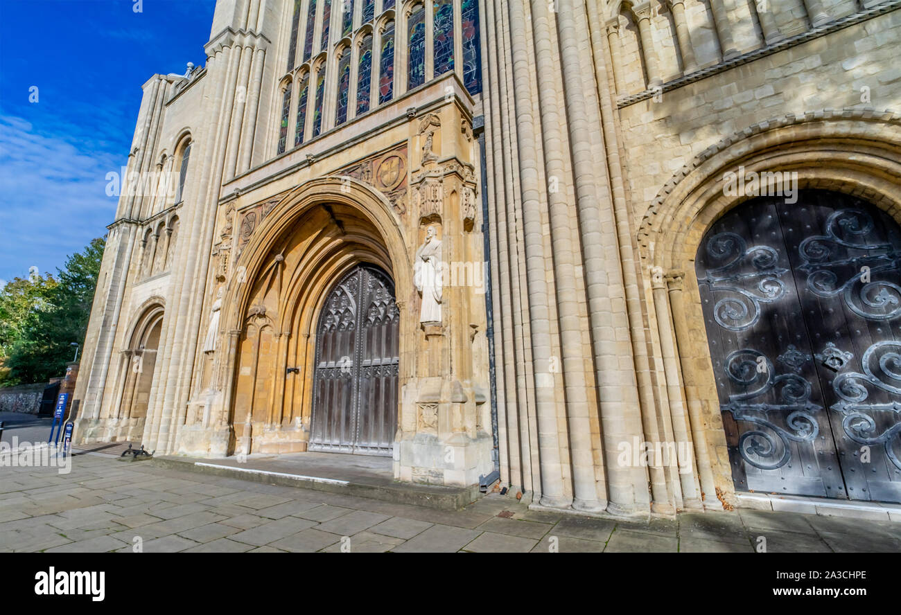 Front of old and historic cathedral built in the medieval Norman times ...